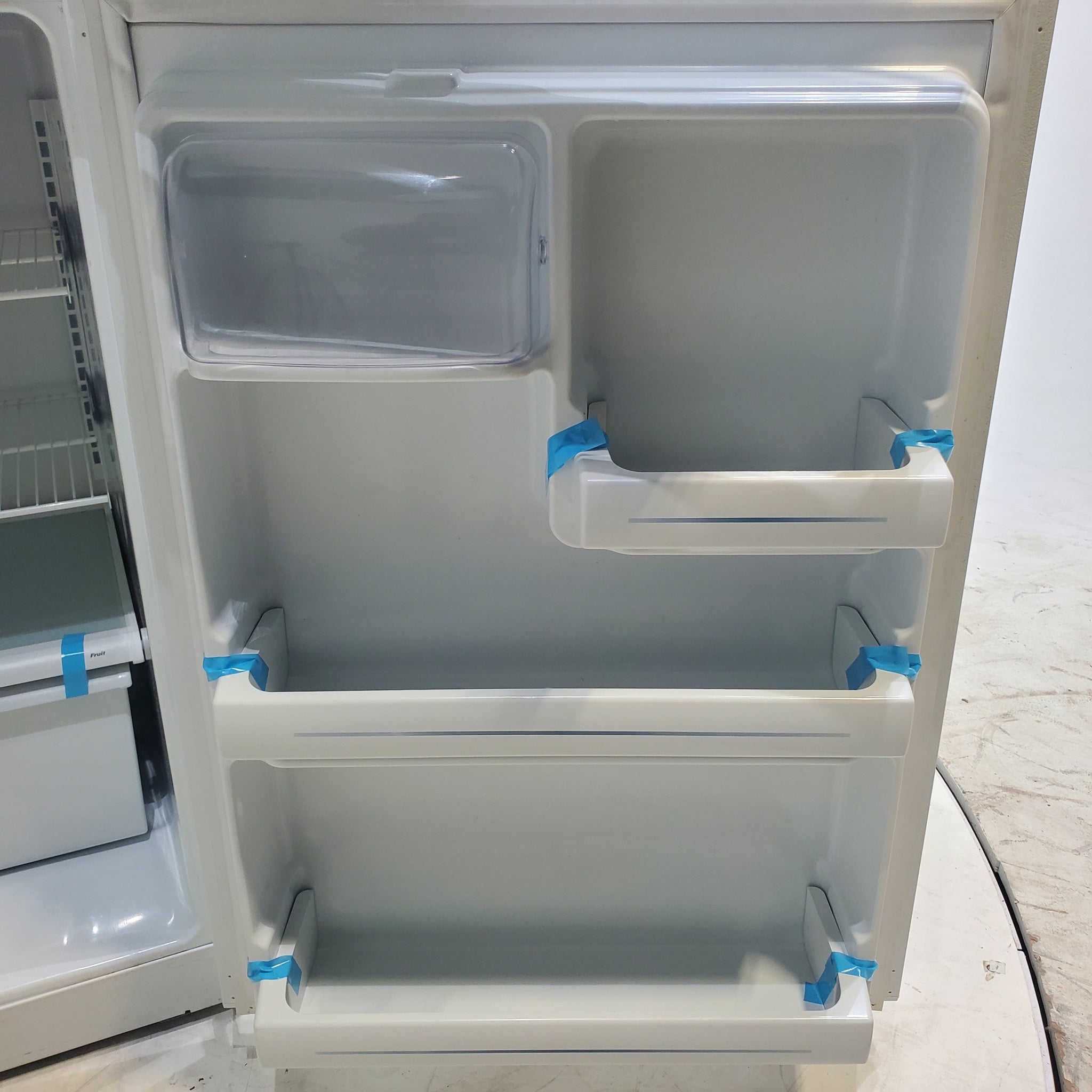 White GE 18 cu. ft. Top Freezer Refrigerator with Reversible Hinges